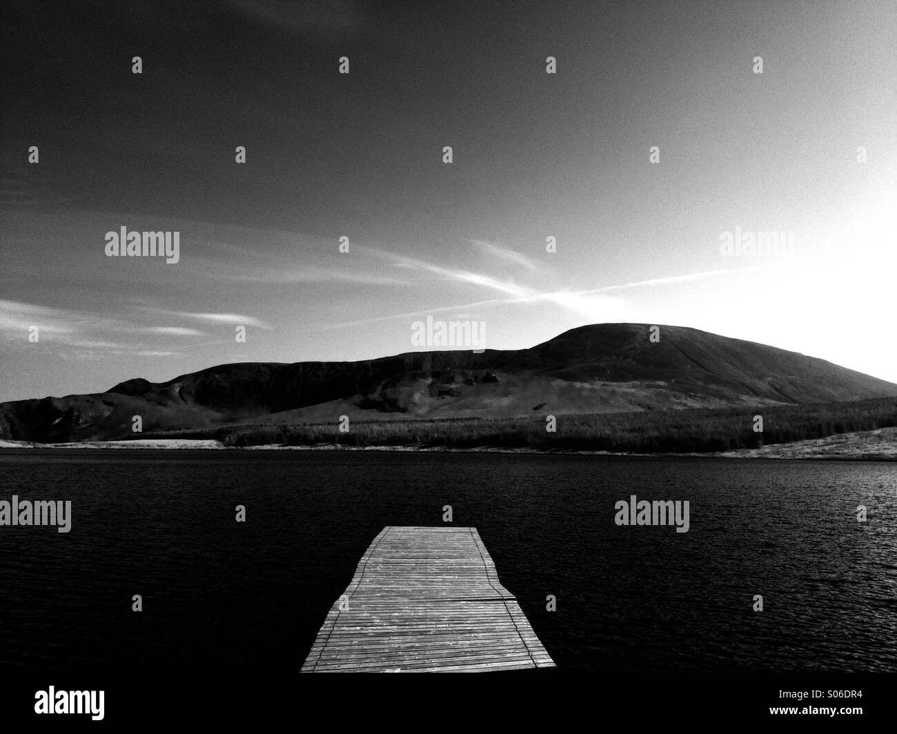 Wooden Jetty into Lake Stock Photo - Alamy