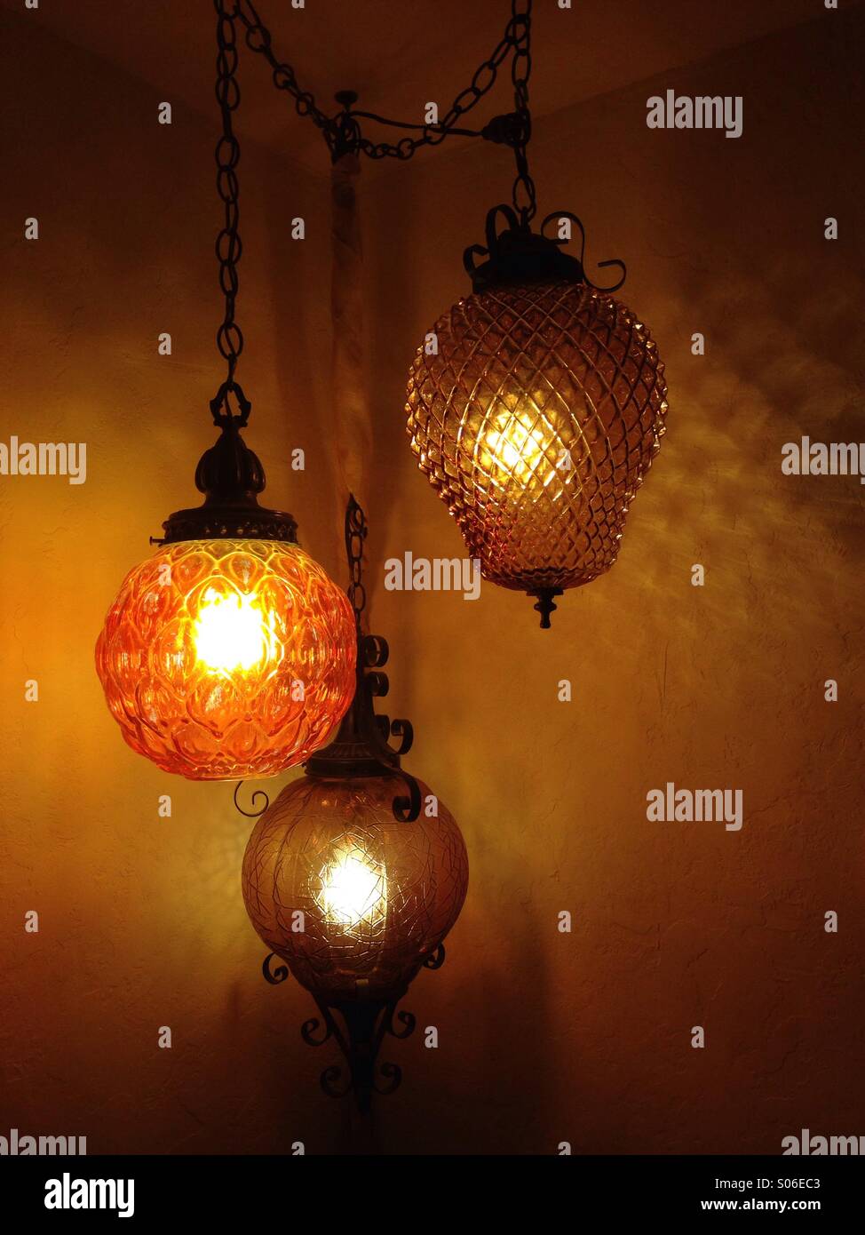 Hanging yellow lamps hi-res stock photography and images - Alamy