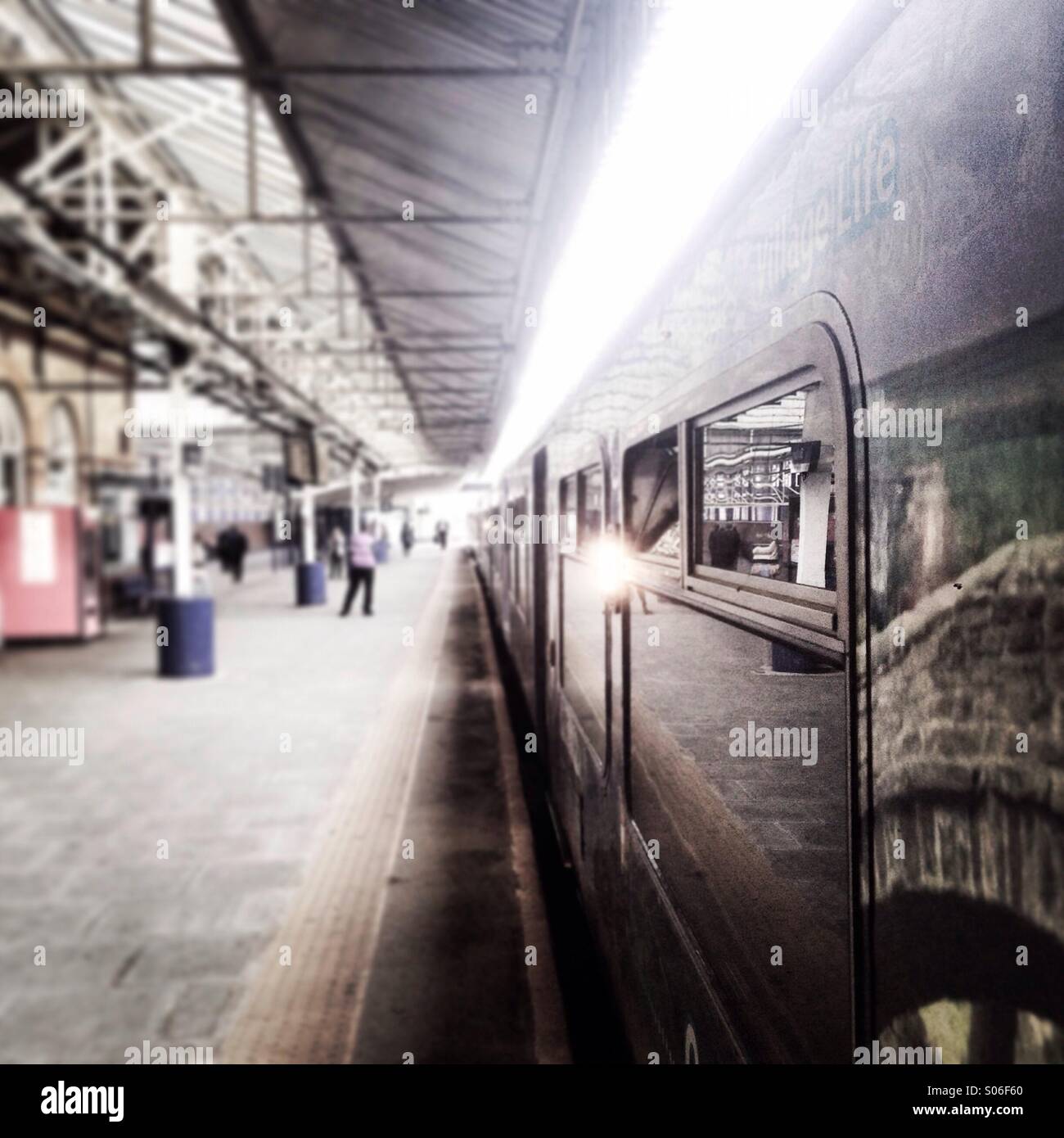 And the train rolls out Stock Photo - Alamy