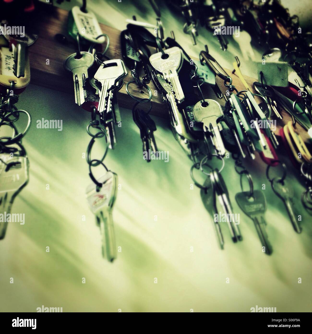 Many keys on wall Stock Photo - Alamy