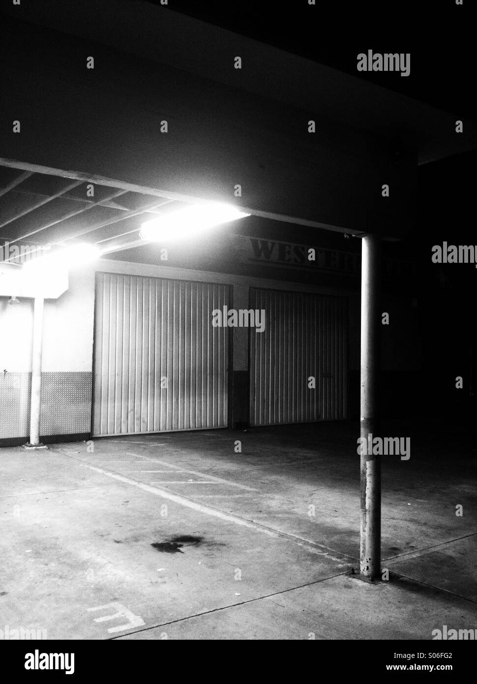 Car garage at night Stock Photo - Alamy