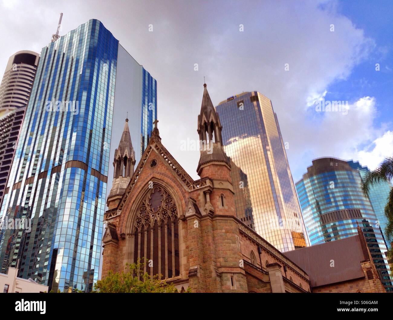 St Stephens Church in Brisbane with modern skyscrapers behind Stock ...
