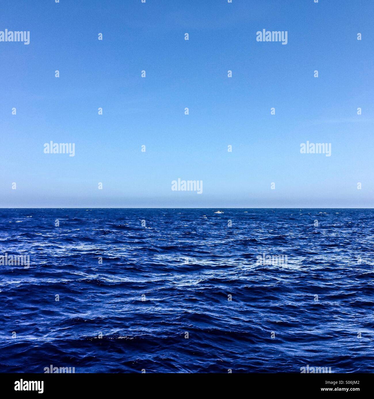 Blue Sky and ocean Stock Photo - Alamy