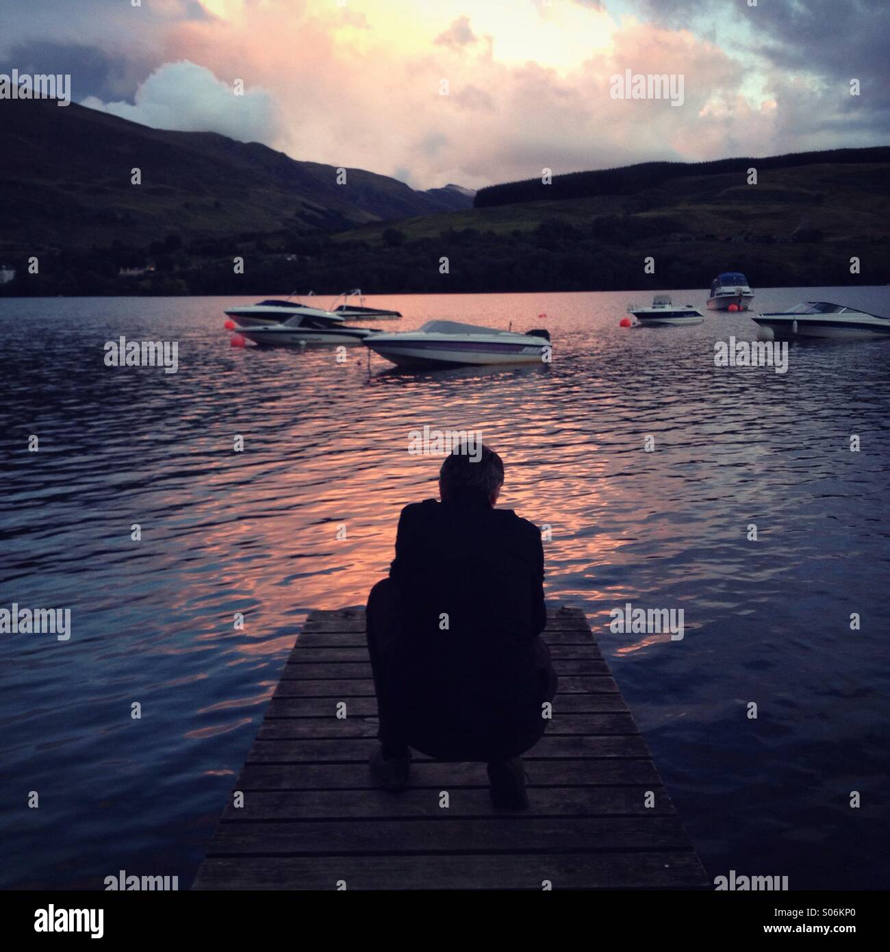 Man looking out at loch hi-res stock photography and images - Alamy