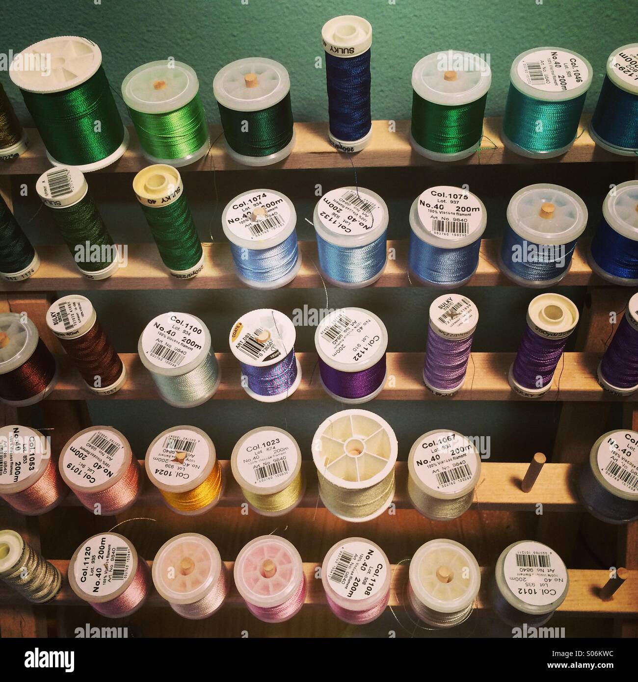 Thread selection for home fabric design studio, Seattle USA Stock Photo ...