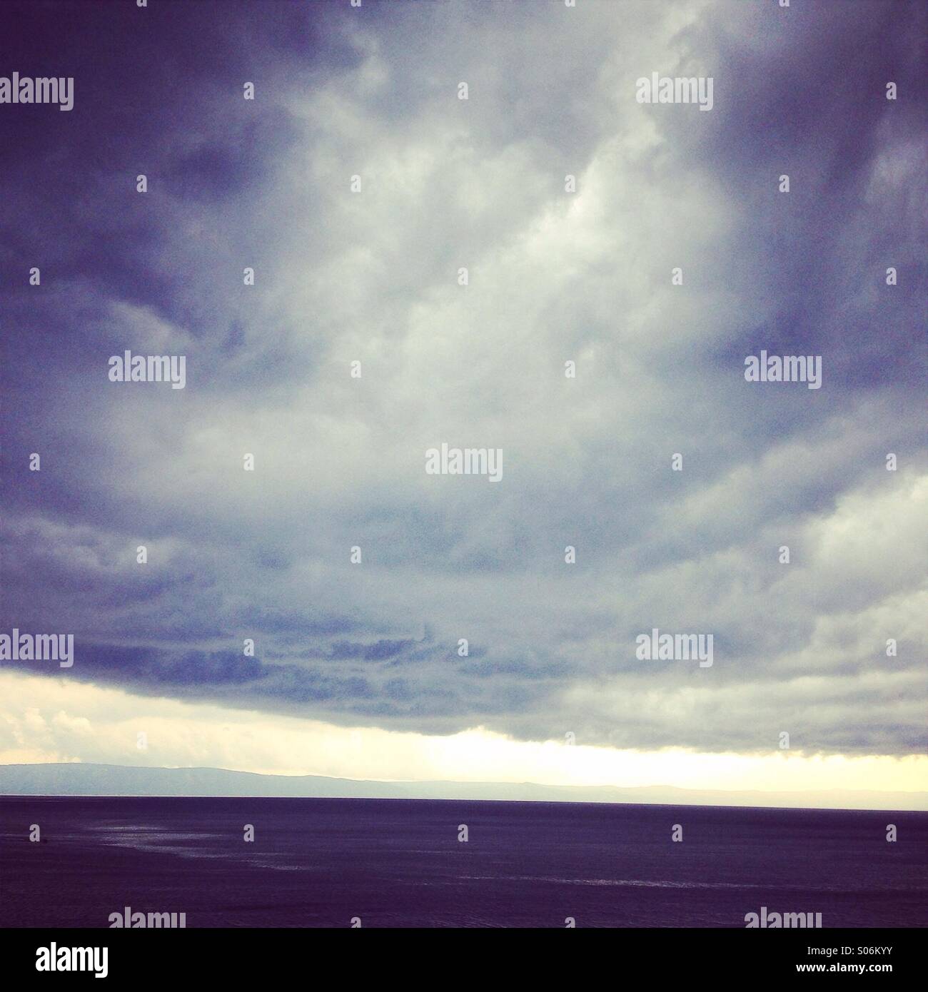 Storm clouds over sea hi-res stock photography and images - Alamy
