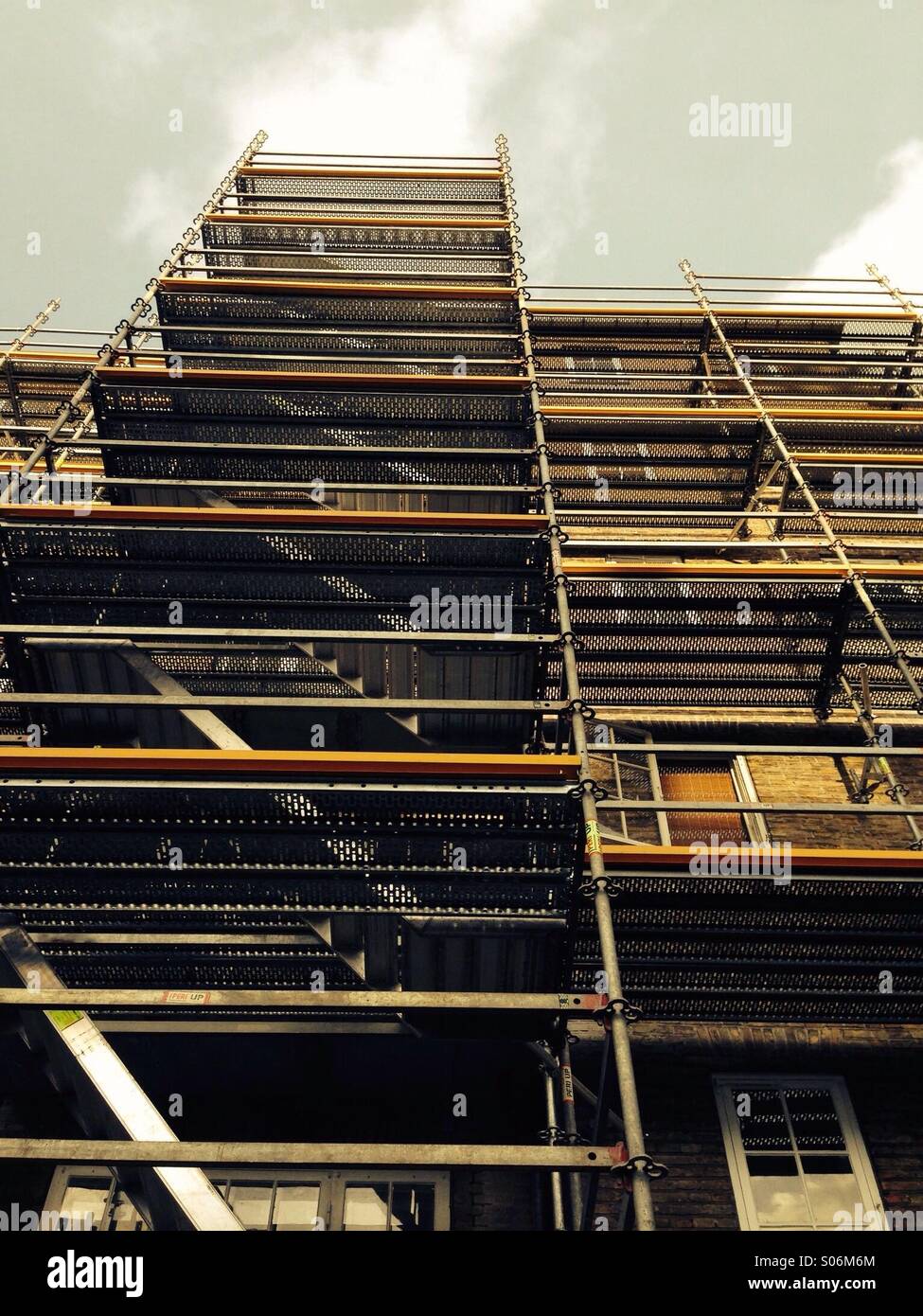 Scaffolding covered building hi-res stock photography and images - Alamy