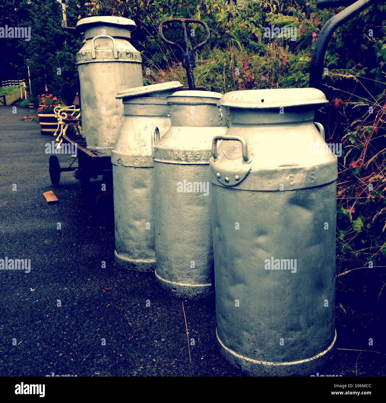 Vintage milk churns hi-res stock photography and images - Alamy