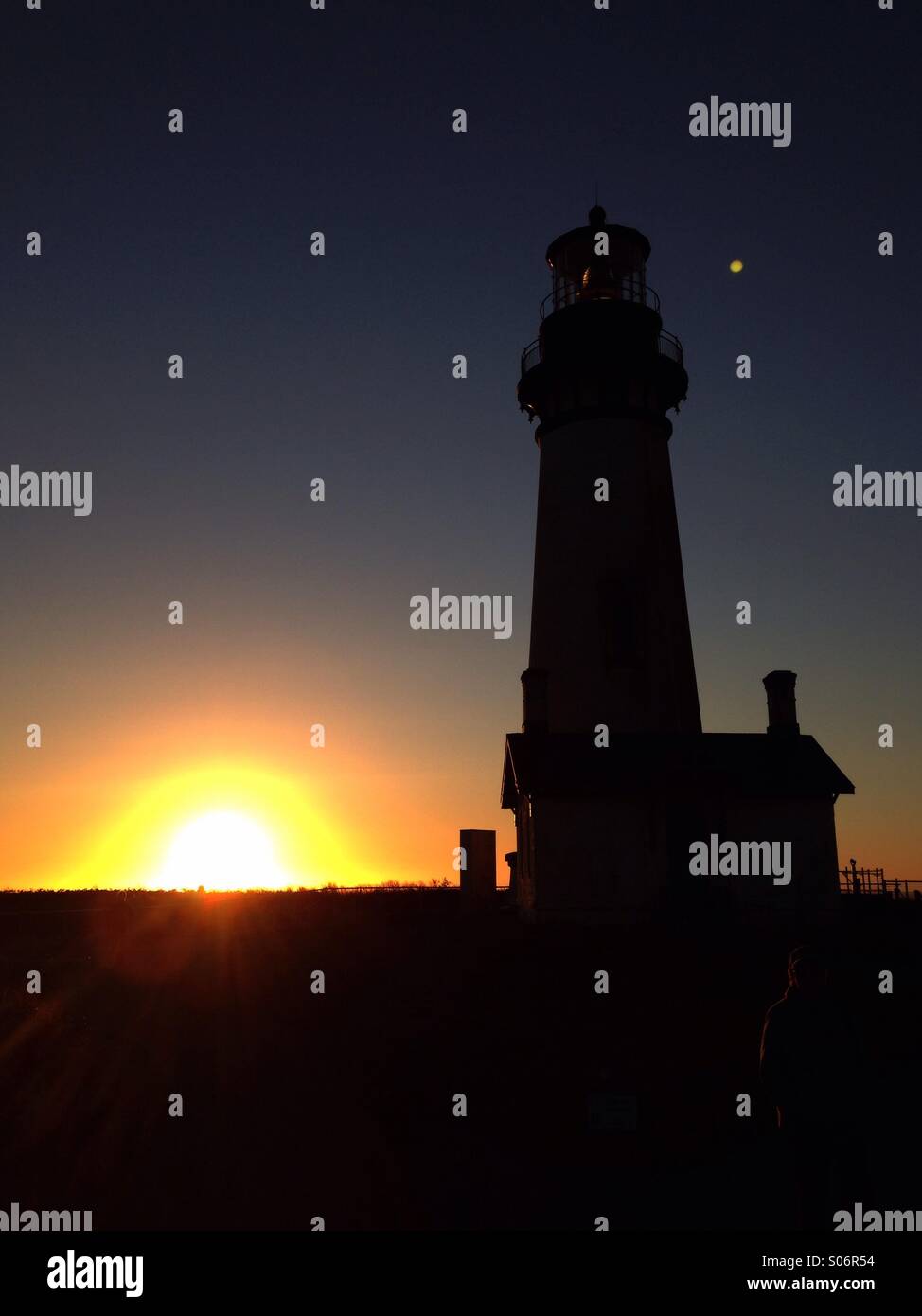 Seashore lighthouse sunset hi-res stock photography and images - Alamy