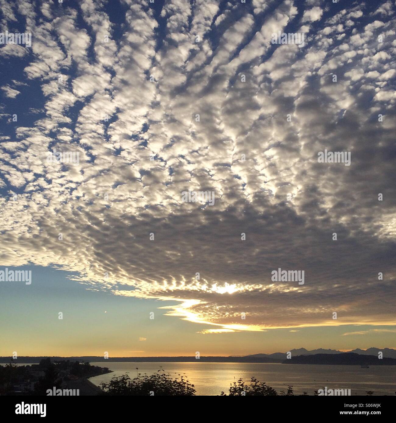 Sunset and clouds over Puget Sound, Seattle, Washington Stock Photo - Alamy