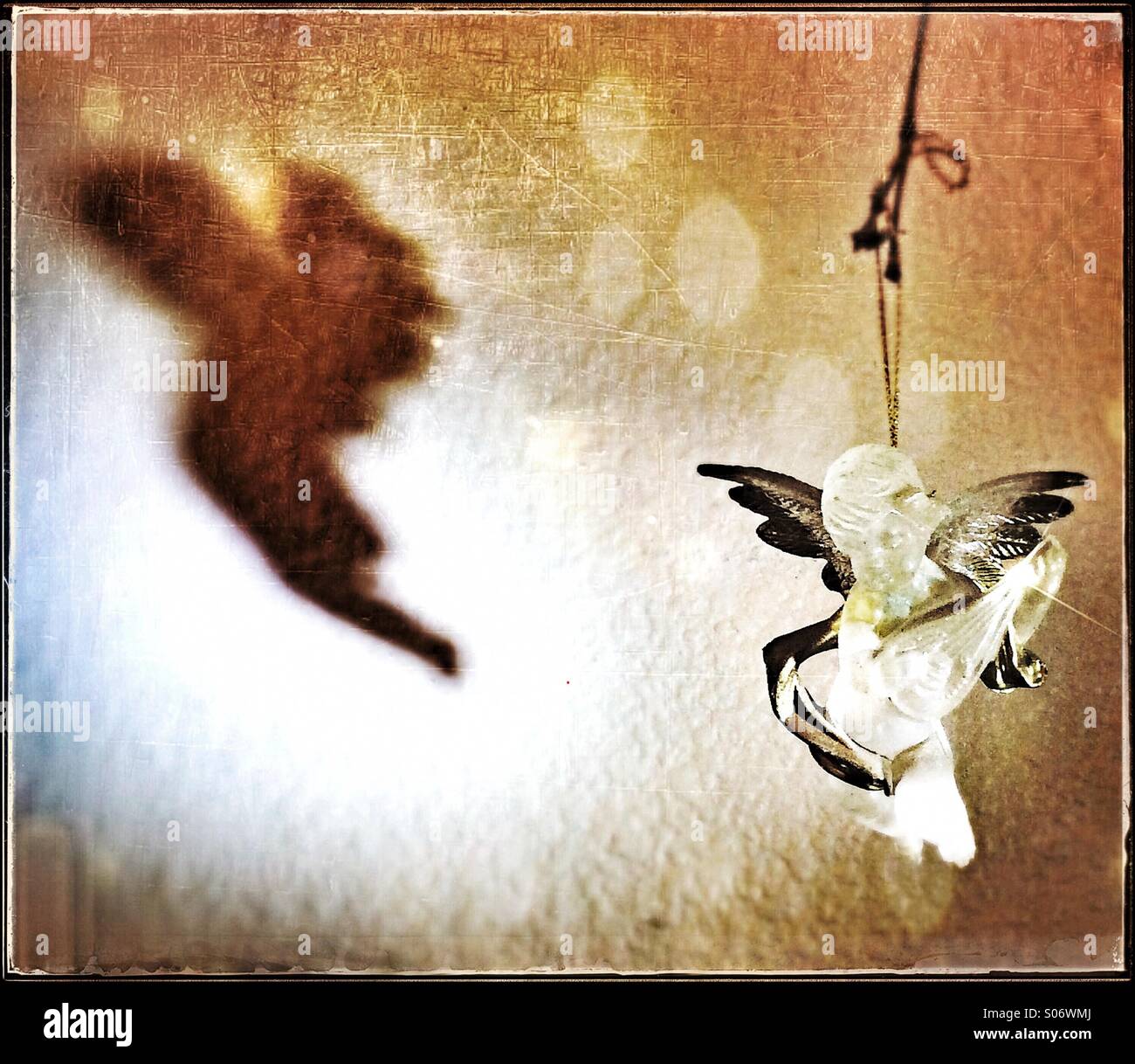 Angel hanging on wall hi-res stock photography and images - Alamy