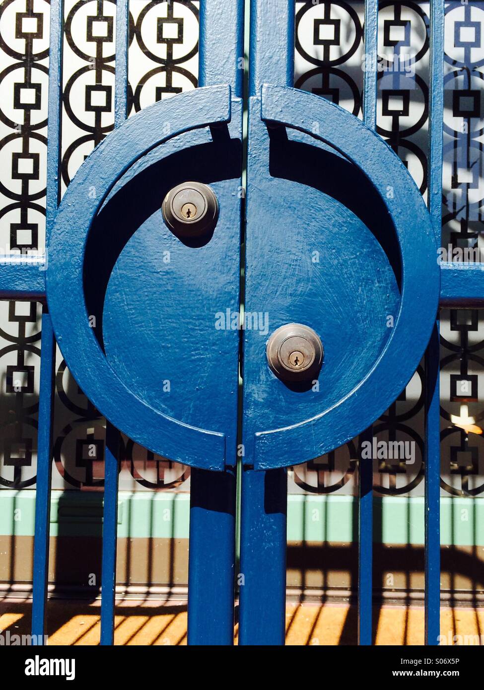 Blue gate close-up, metal gate lock close up Stock Photo - Alamy