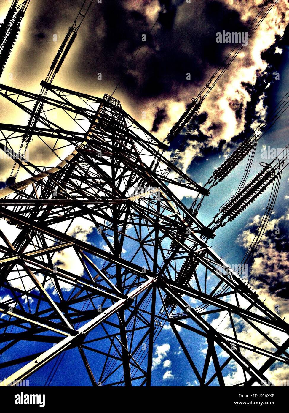 Cloudy skies with pylon hi-res stock photography and images - Alamy