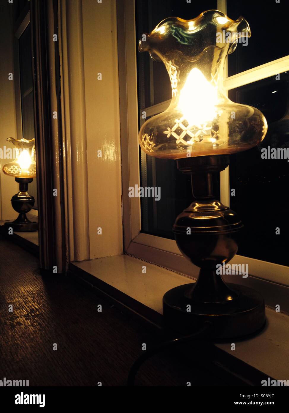 Lamps in a traditional pub window Stock Photo - Alamy