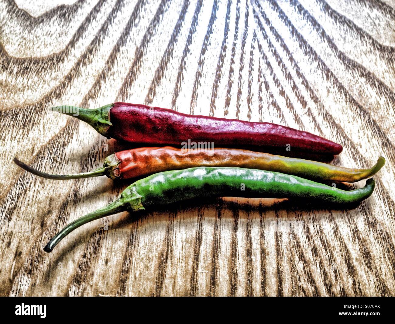 Colourful chilli peppers Stock Photo - Alamy