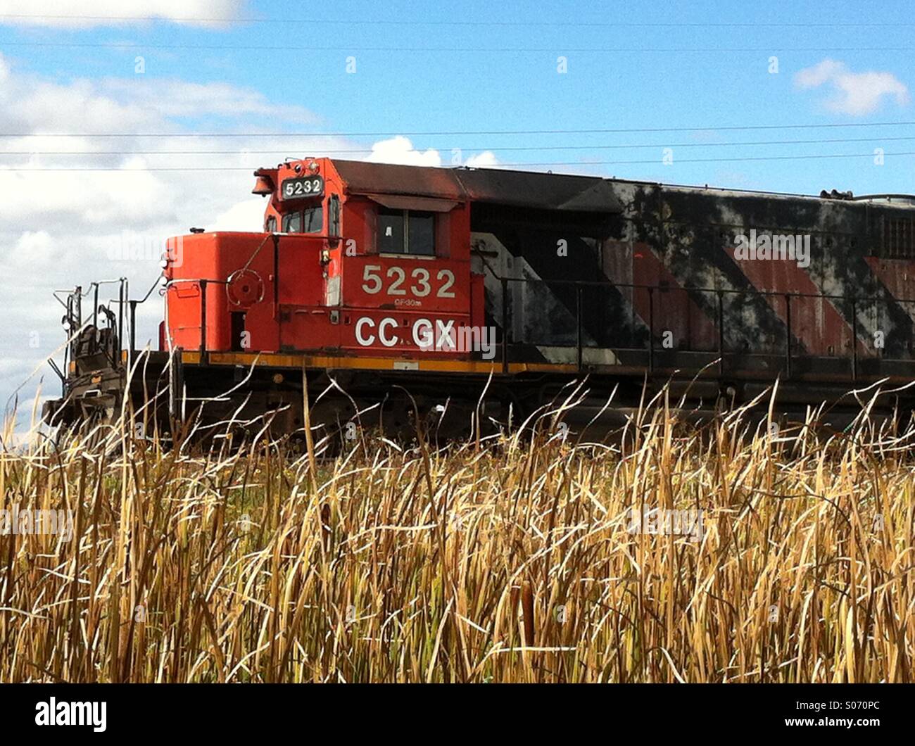 Train in fall field, Canadian Prairies Stock Photo - Alamy