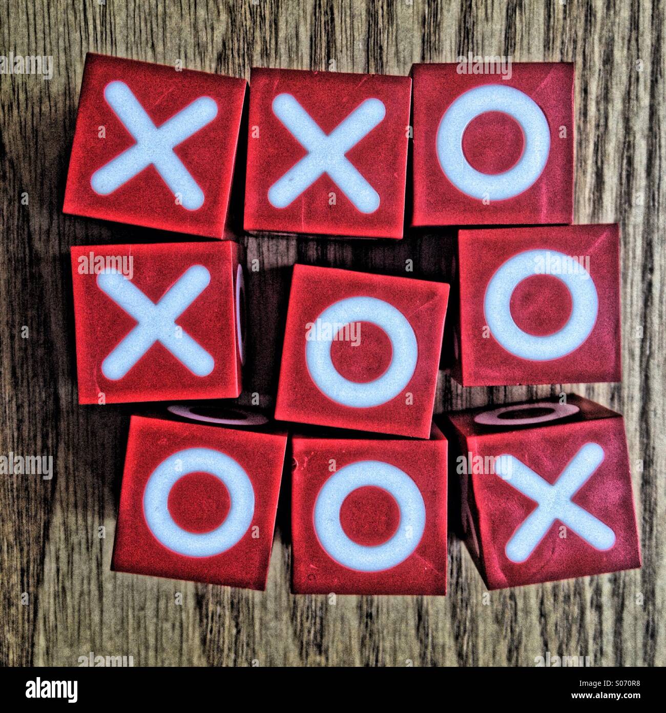 Noughts and crosses game Stock Photo - Alamy