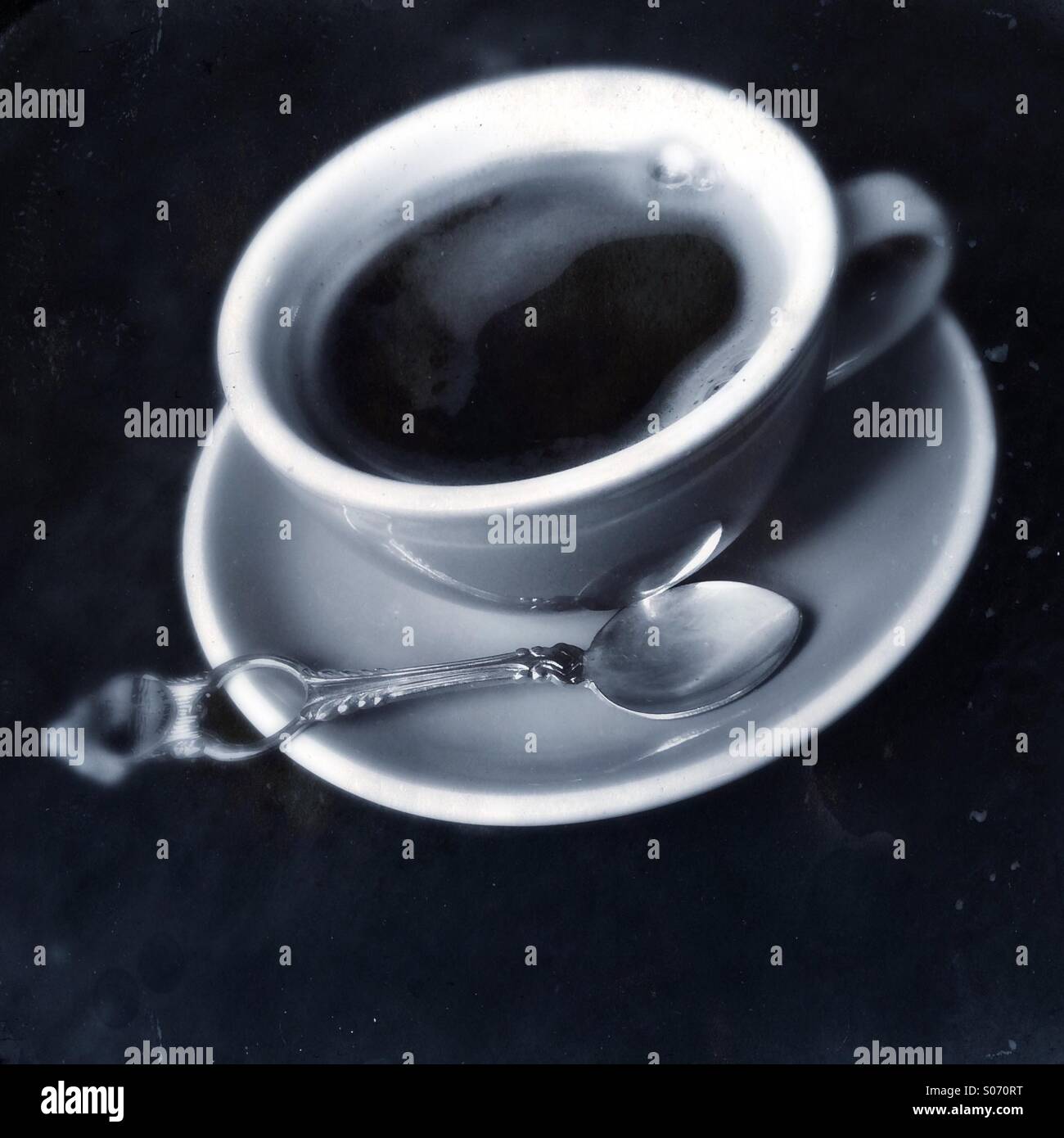 Coffee cup and spoon Stock Photo - Alamy