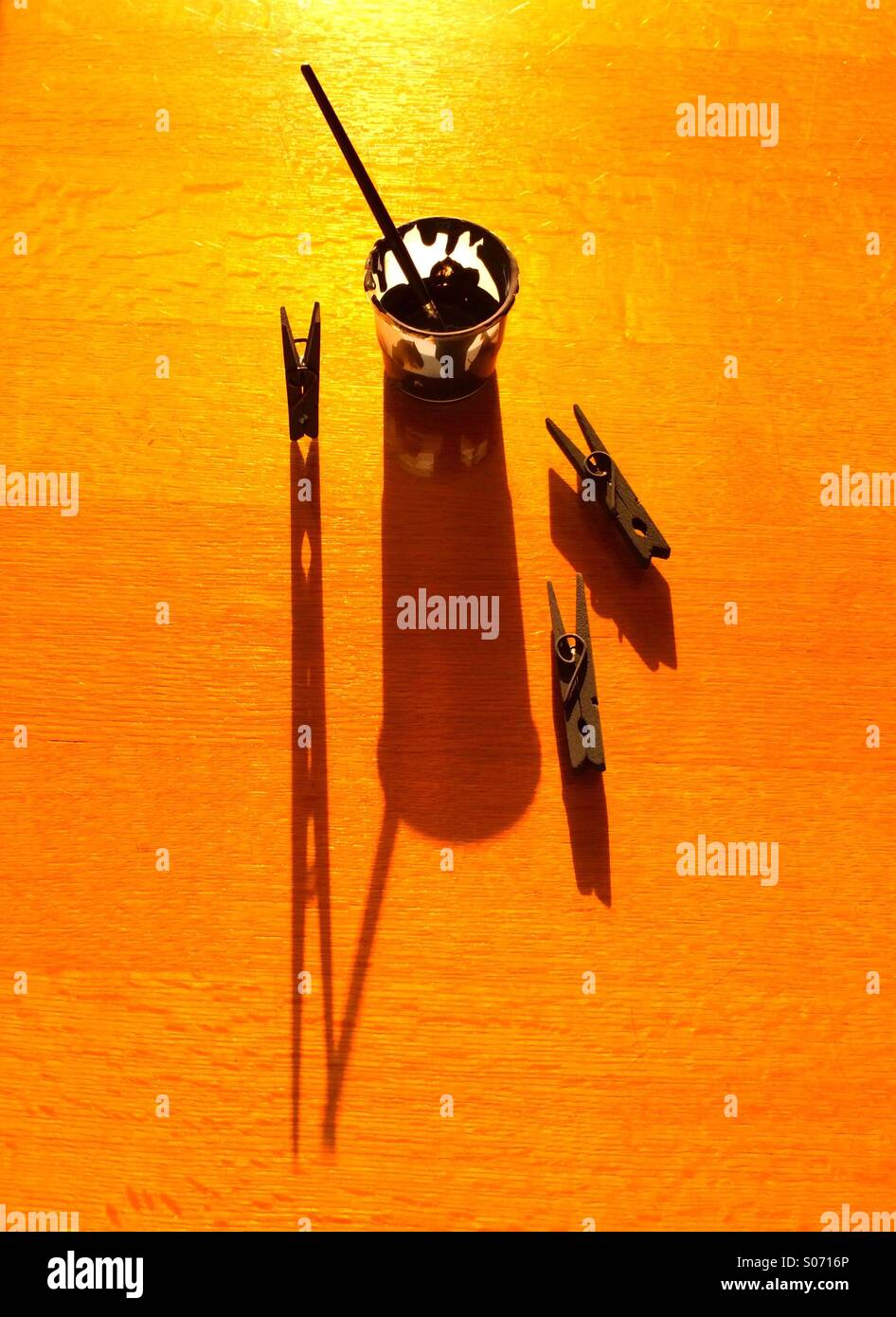 Sunburst clothes pegs and paint Stock Photo - Alamy