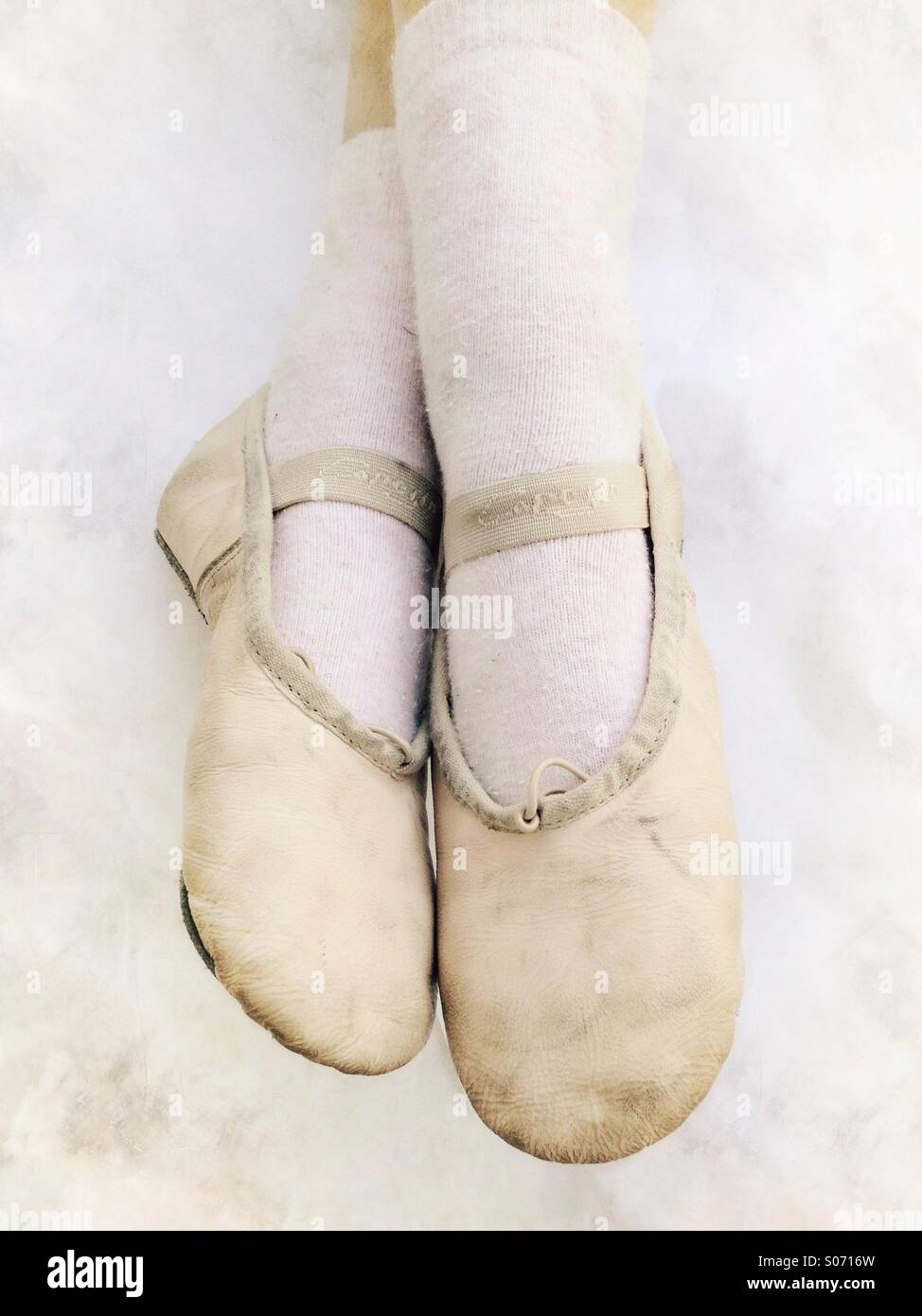 Ballet shoes worn by young girl Stock Photo - Alamy