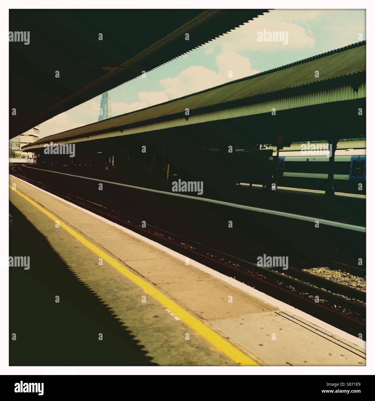 Rail station, waiting for a train. The Shard in the distance Stock ...
