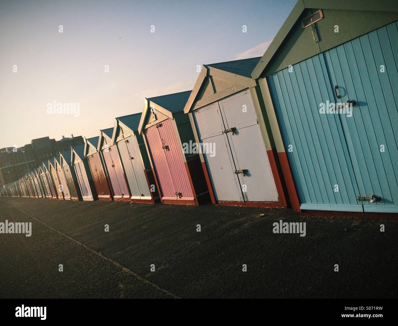 Brighton beach huts sunset hi-res stock photography and images - Alamy
