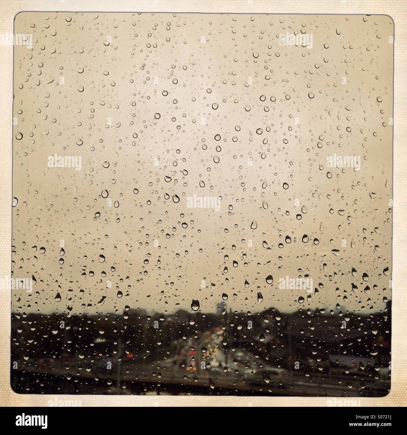 View of motorway from a rainy office window Stock Photo - Alamy