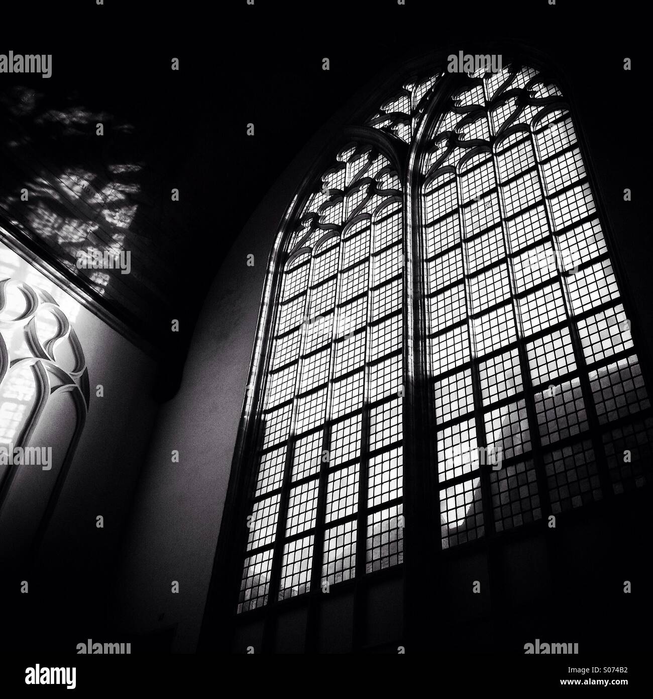 Church window with shadow on wall Stock Photo - Alamy
