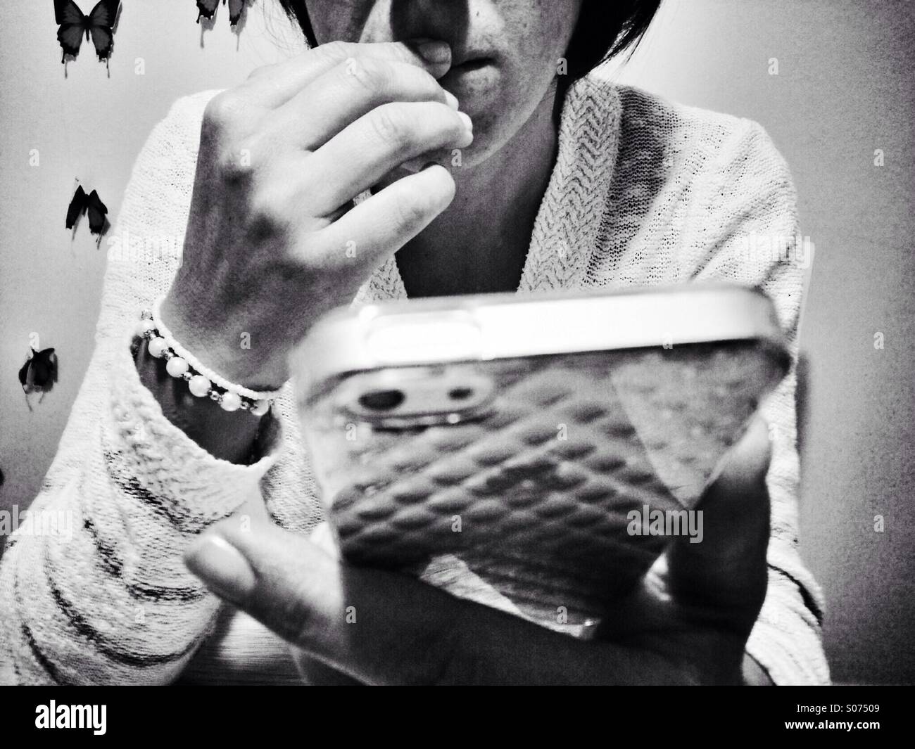 woman-reads-text-messages-on-her-phone-stock-photo-alamy
