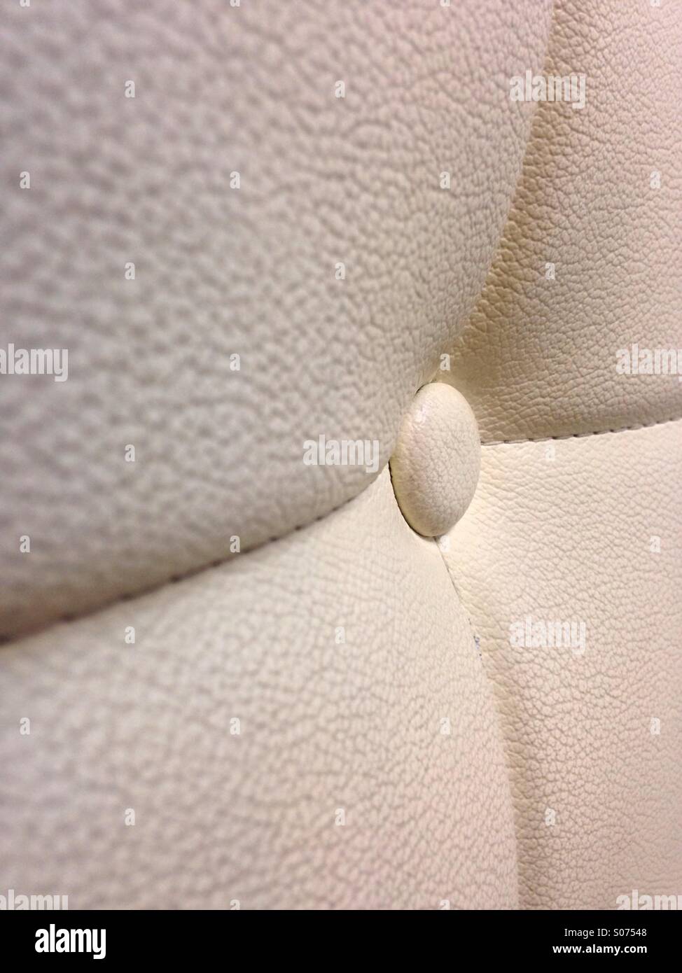 Leather seat button Stock Photo - Alamy