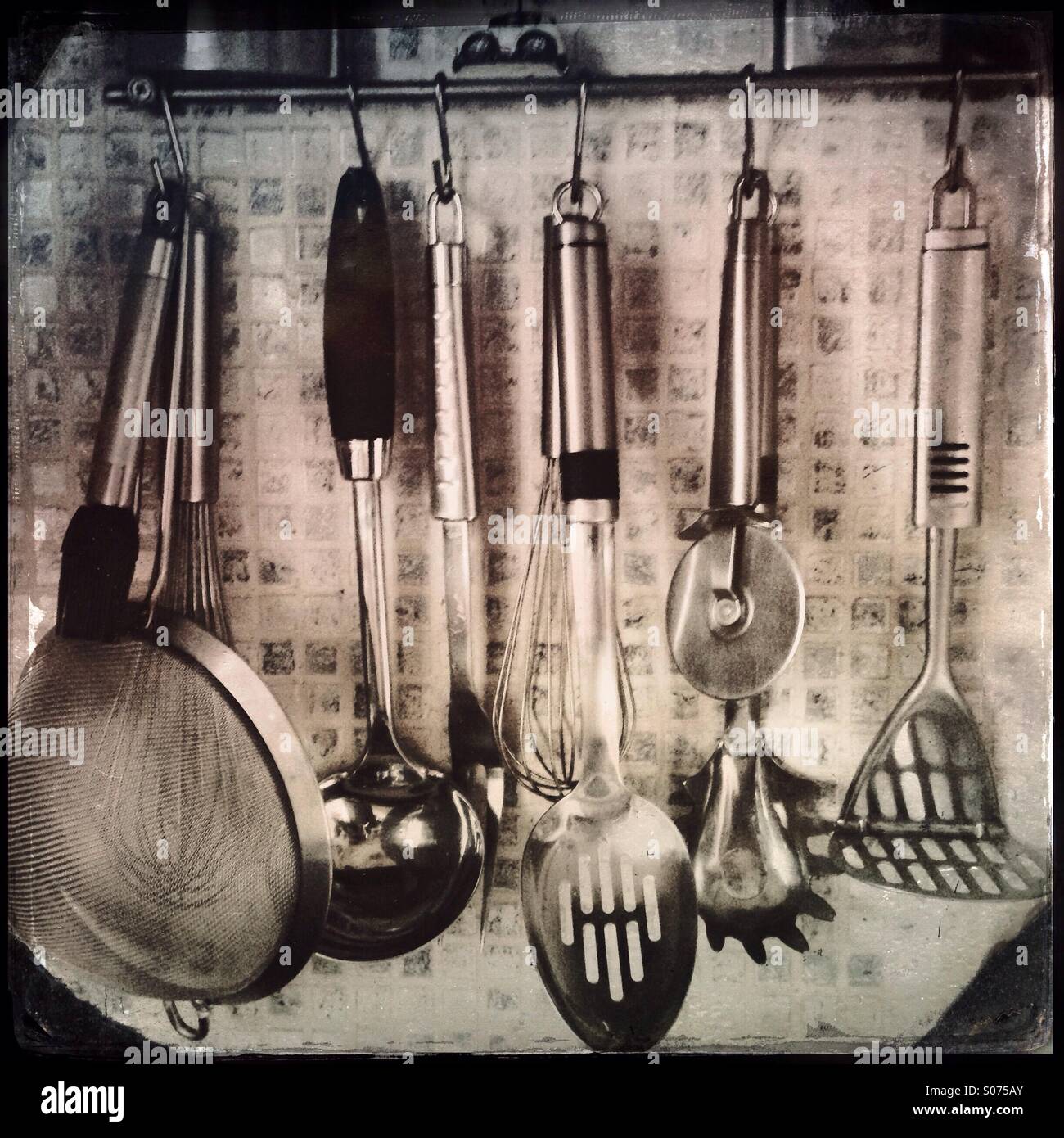 Hanging utensils hi-res stock photography and images - Alamy
