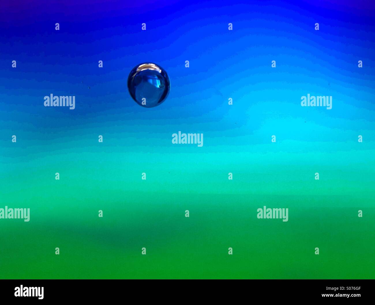 Water bubble on inside of a glass Stock Photo - Alamy