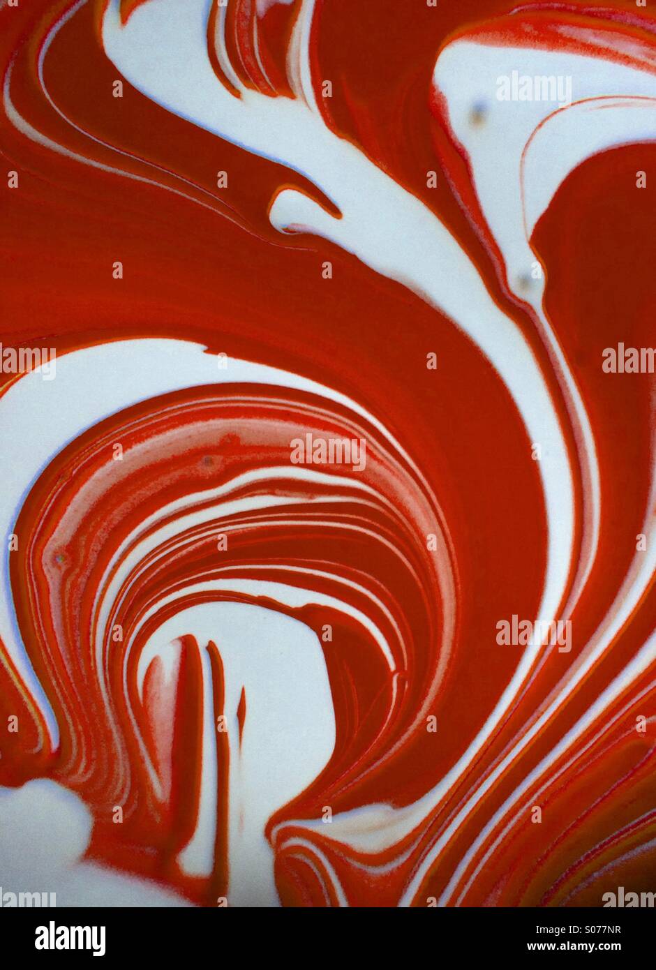 Paint mixing together Stock Photo - Alamy