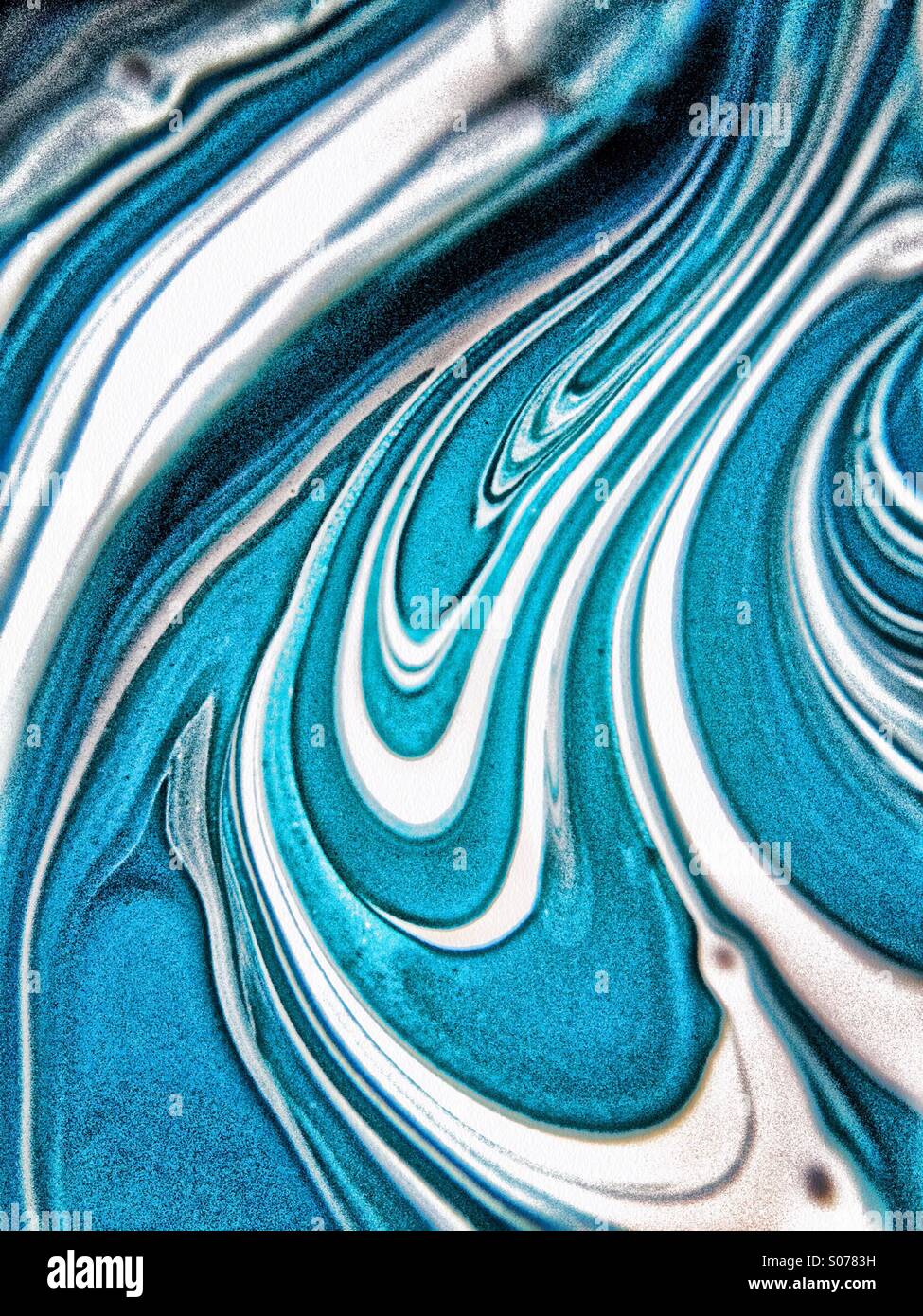 Paint mixing together Stock Photo - Alamy