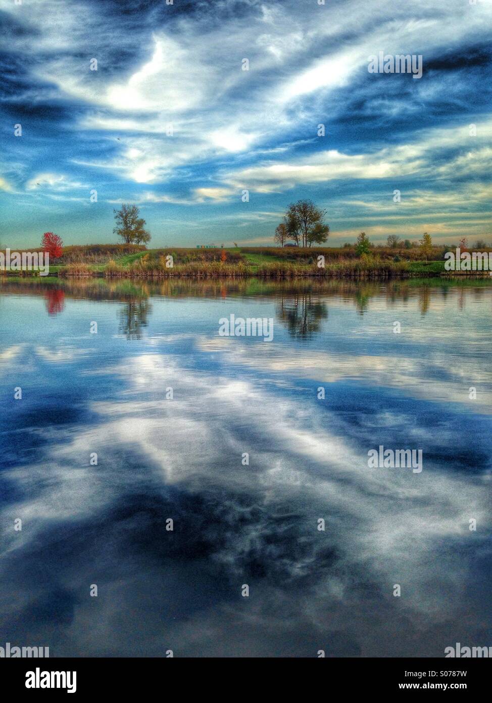 Blue skies reflecting in hi-res stock photography and images - Alamy