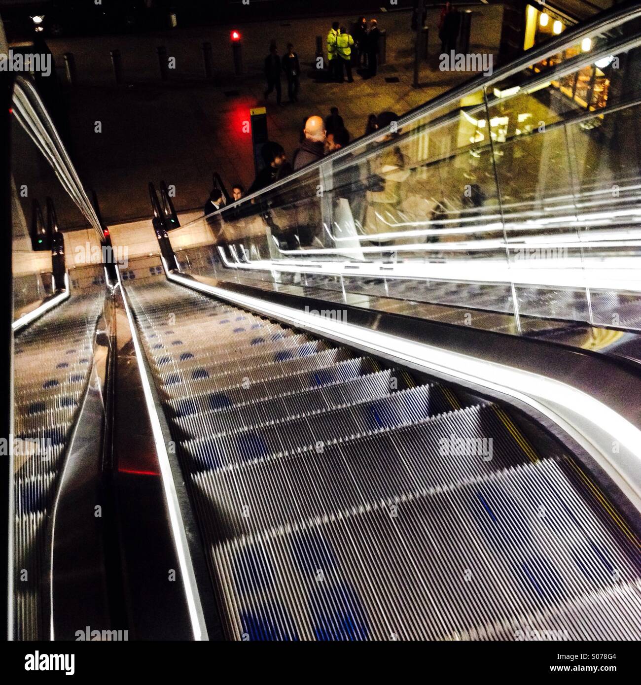 Escalators at night Stock Photo - Alamy