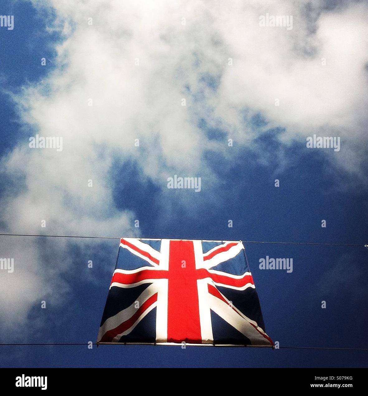 Flag with clouds hi-res stock photography and images - Alamy