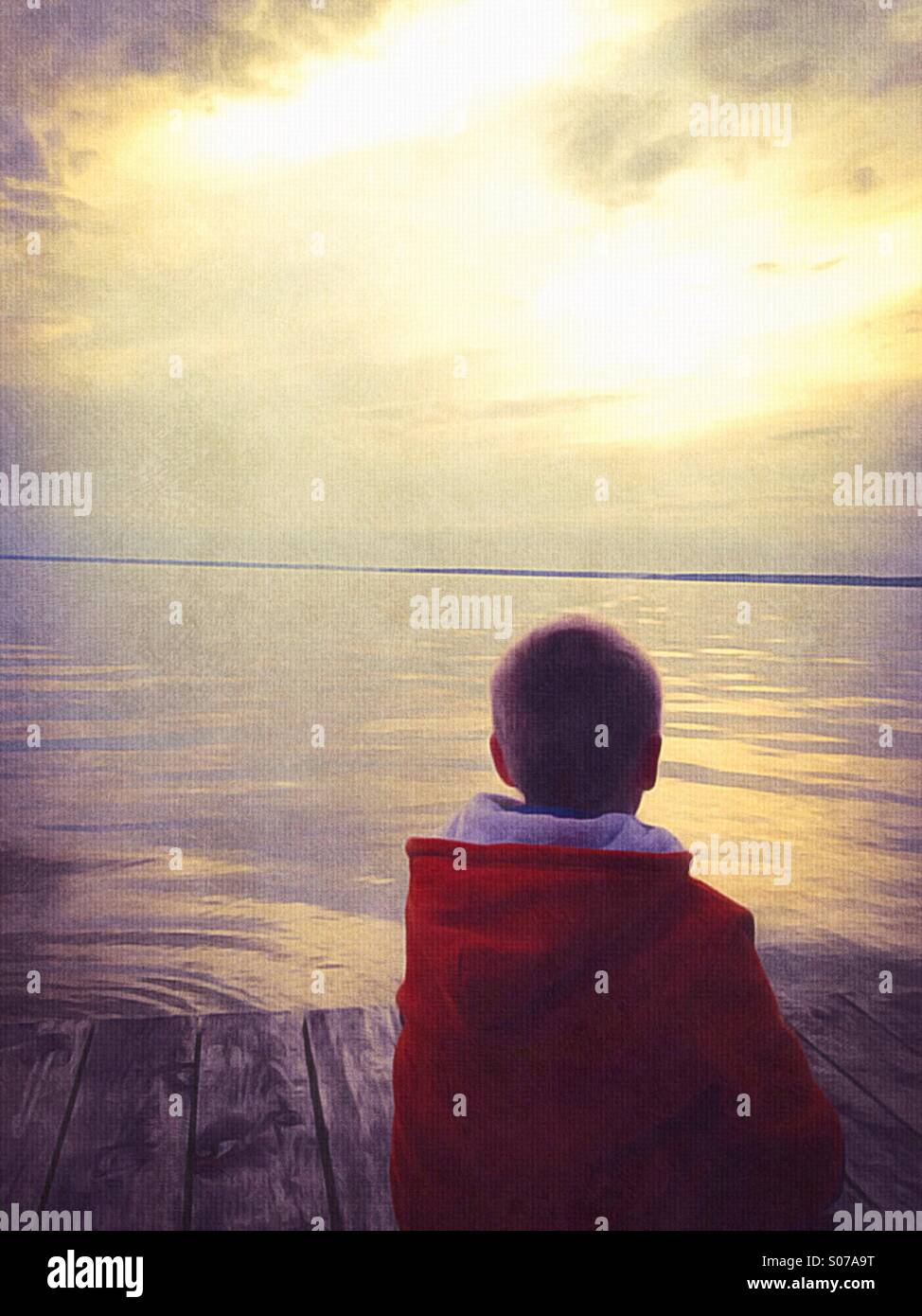 Boy on dock hi-res stock photography and images - Alamy