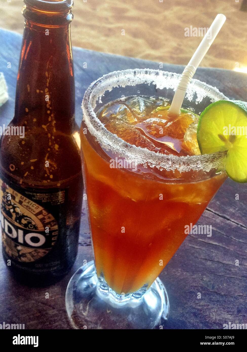 Chelada, beer cocktail with lime,salt and ice Stock Photo - Alamy