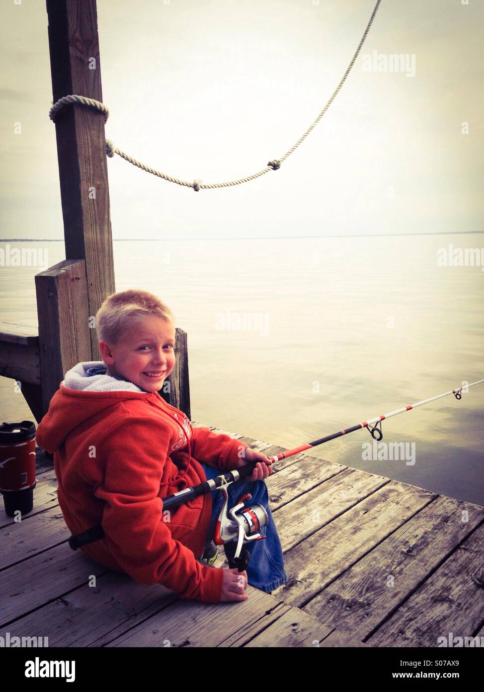 Fishing off a dock hi-res stock photography and images - Alamy