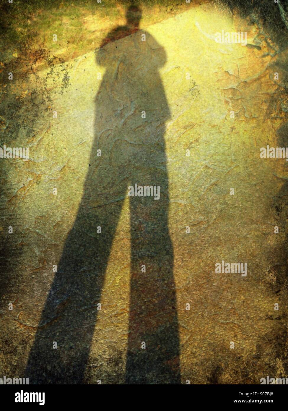 A tall shadow taking a walk Stock Photo - Alamy