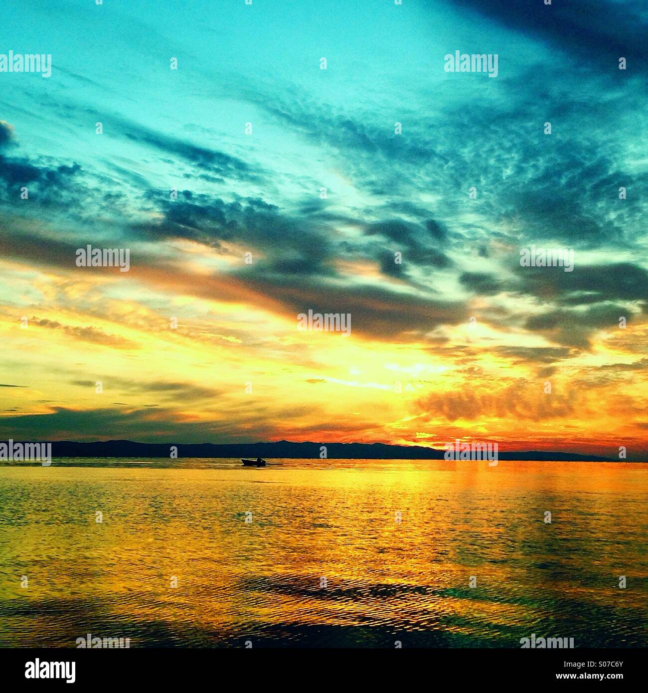 Beautiful sunset at sea Stock Photo - Alamy