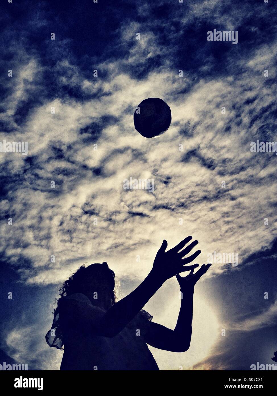 Girl Catch Ball High Resolution Stock Photography and Images - Alamy