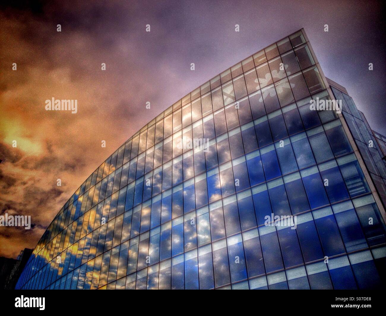 Clouds reflect in windows hi-res stock photography and images - Alamy