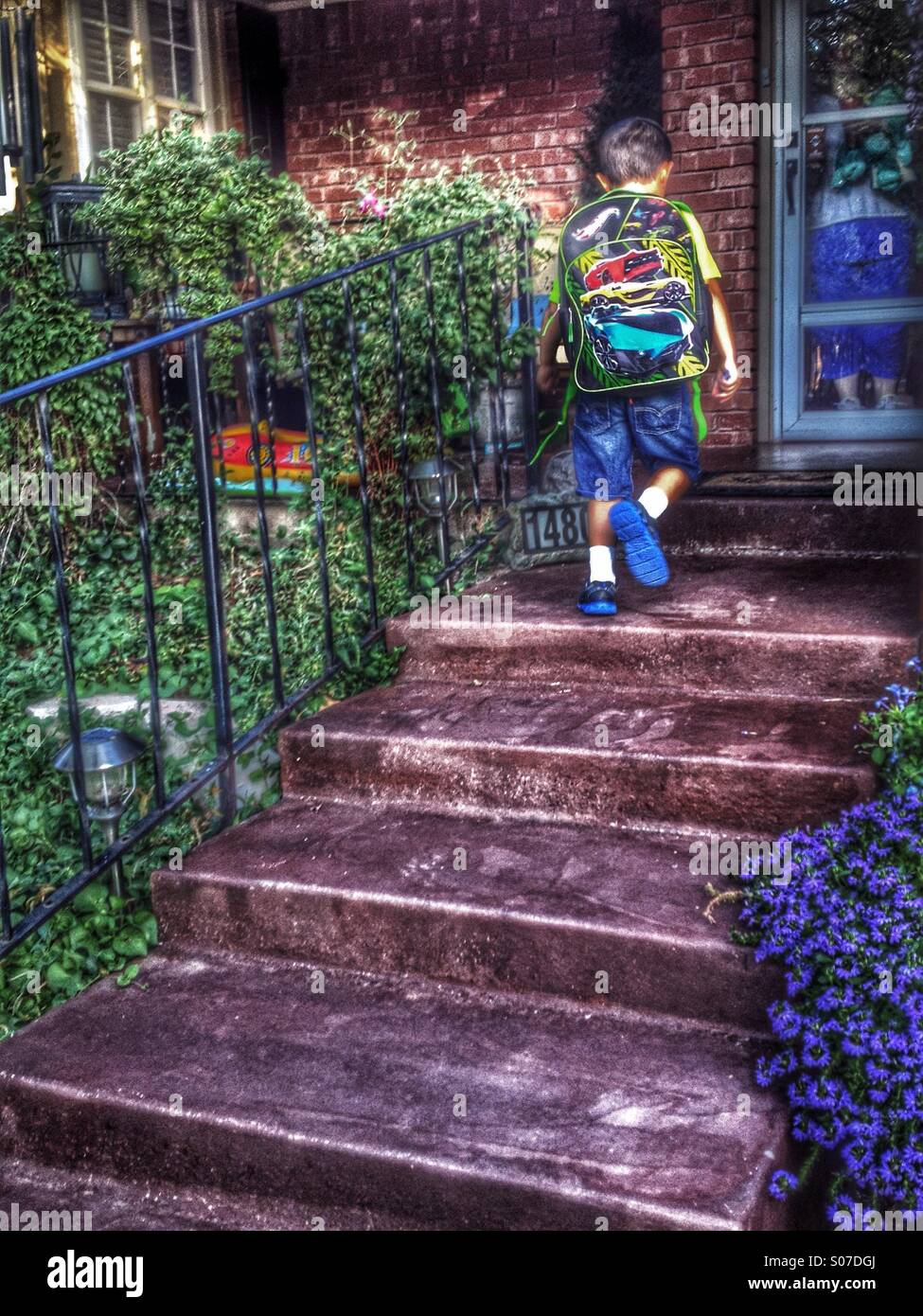 Boy on steps boy on steps hi-res stock photography and images - Alamy