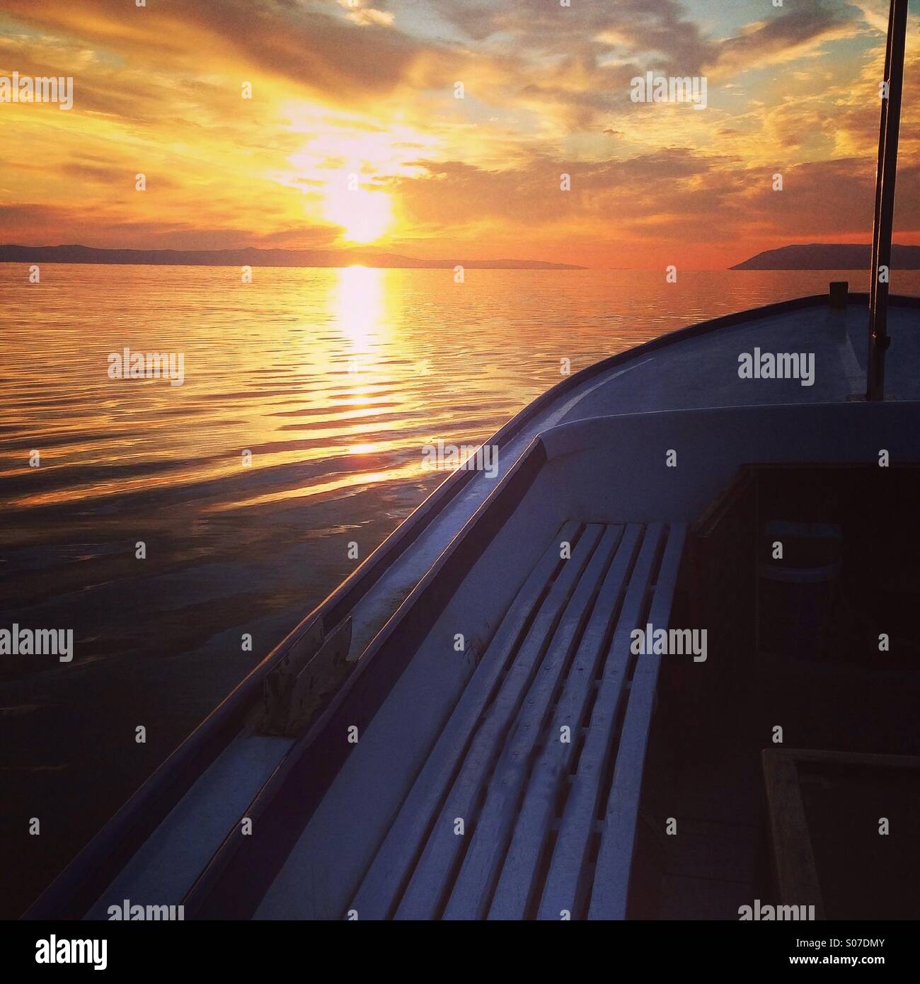 Calm sea in sunset hi-res stock photography and images - Alamy