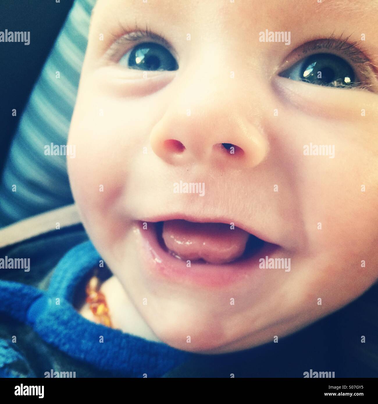 Smiley face baby hi-res stock photography and images - Alamy