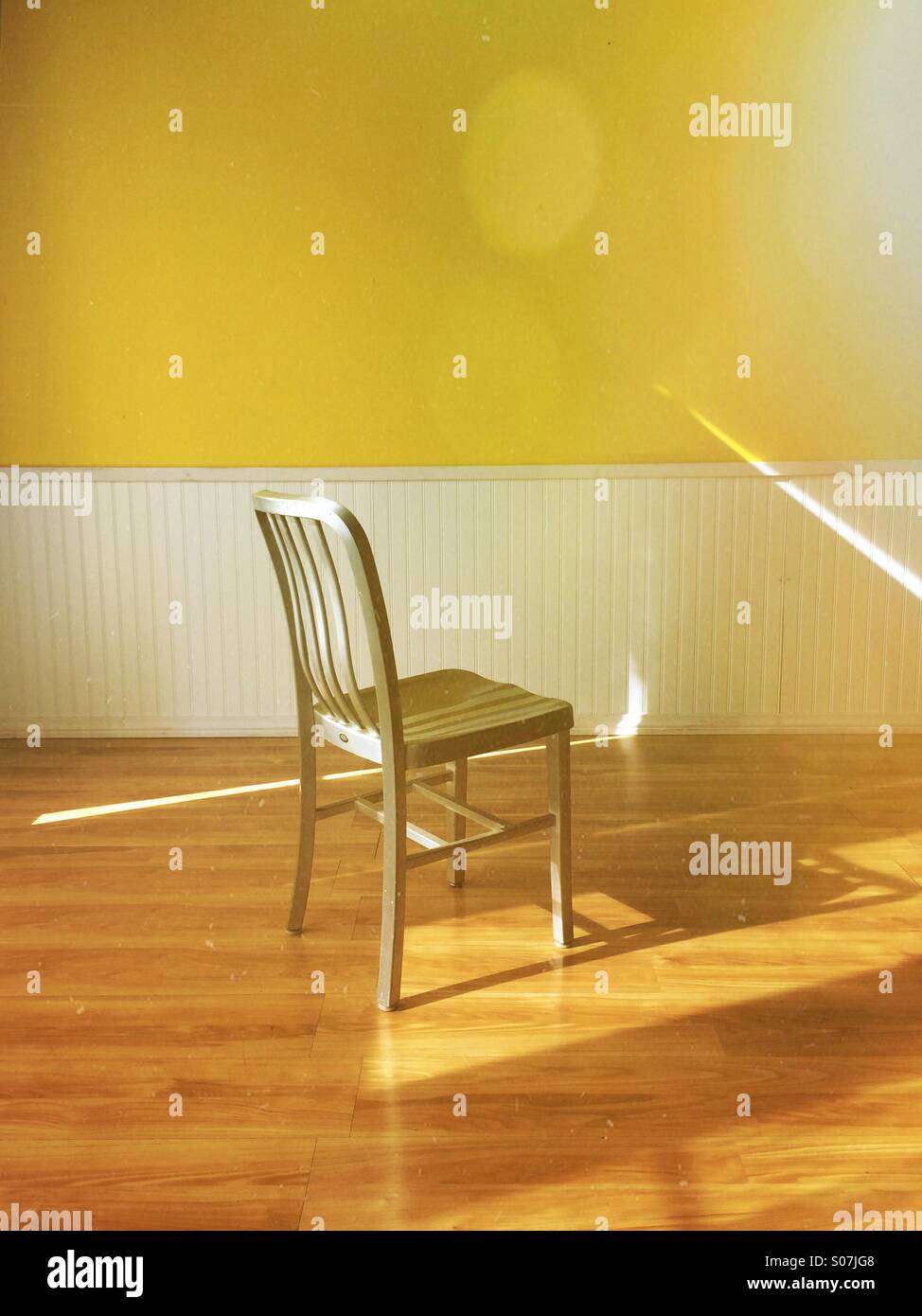 Chair with light Stock Photo - Alamy