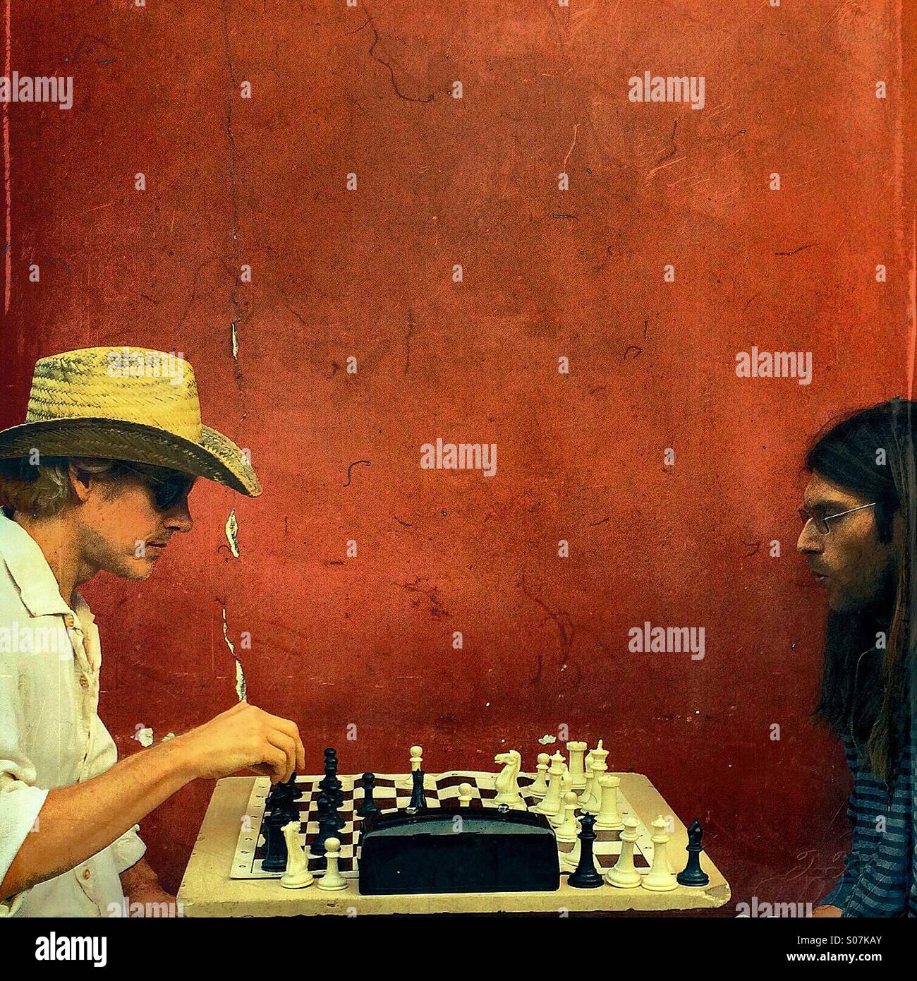 Two men playing chess Stock Photo - Alamy