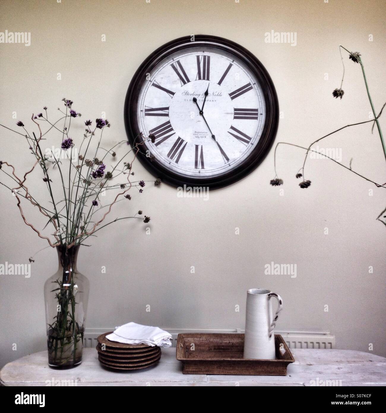 Clock in modern house Stock Photo - Alamy
